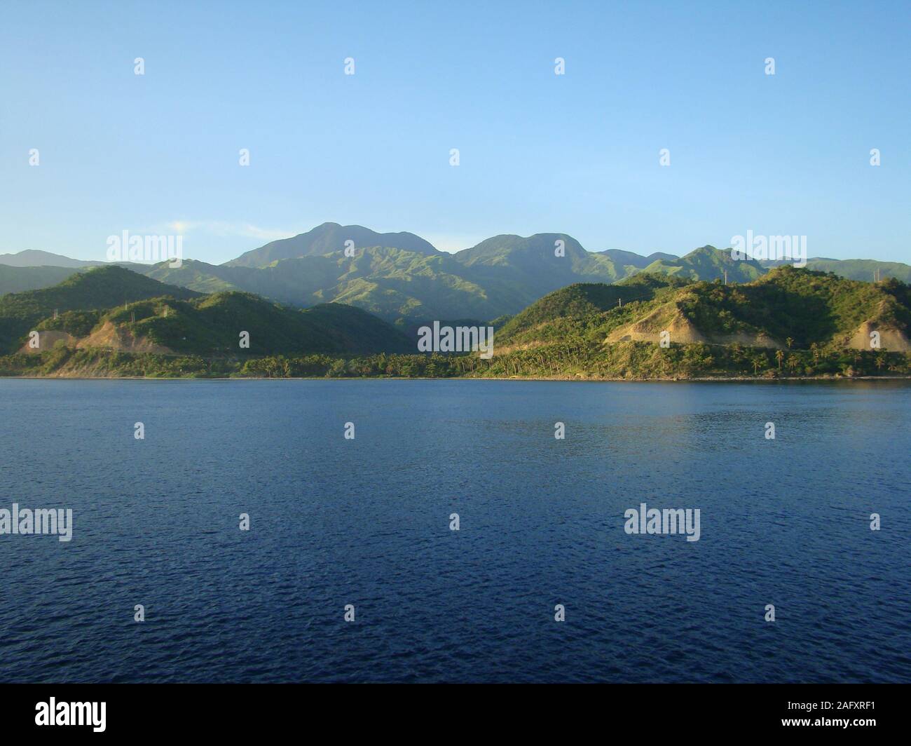 The volcanic Mindoro island, part of The Philippines archipelago, seen ...
