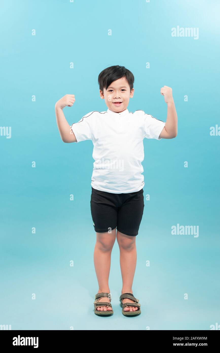Strong muscles and child hi-res stock photography and images - Alamy