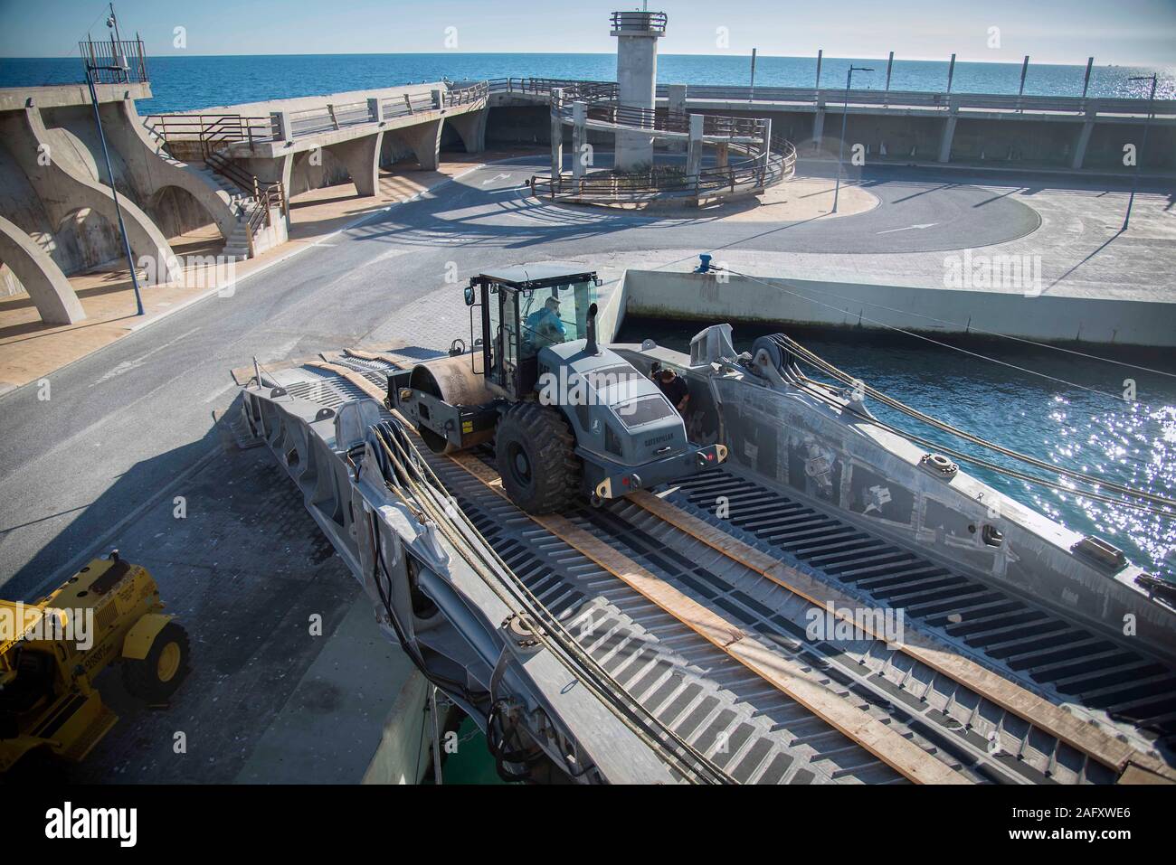 191210-N-PE825-0102: MALAGA, Spain (Dec. 10, 2019) – A Seabee assigned ...