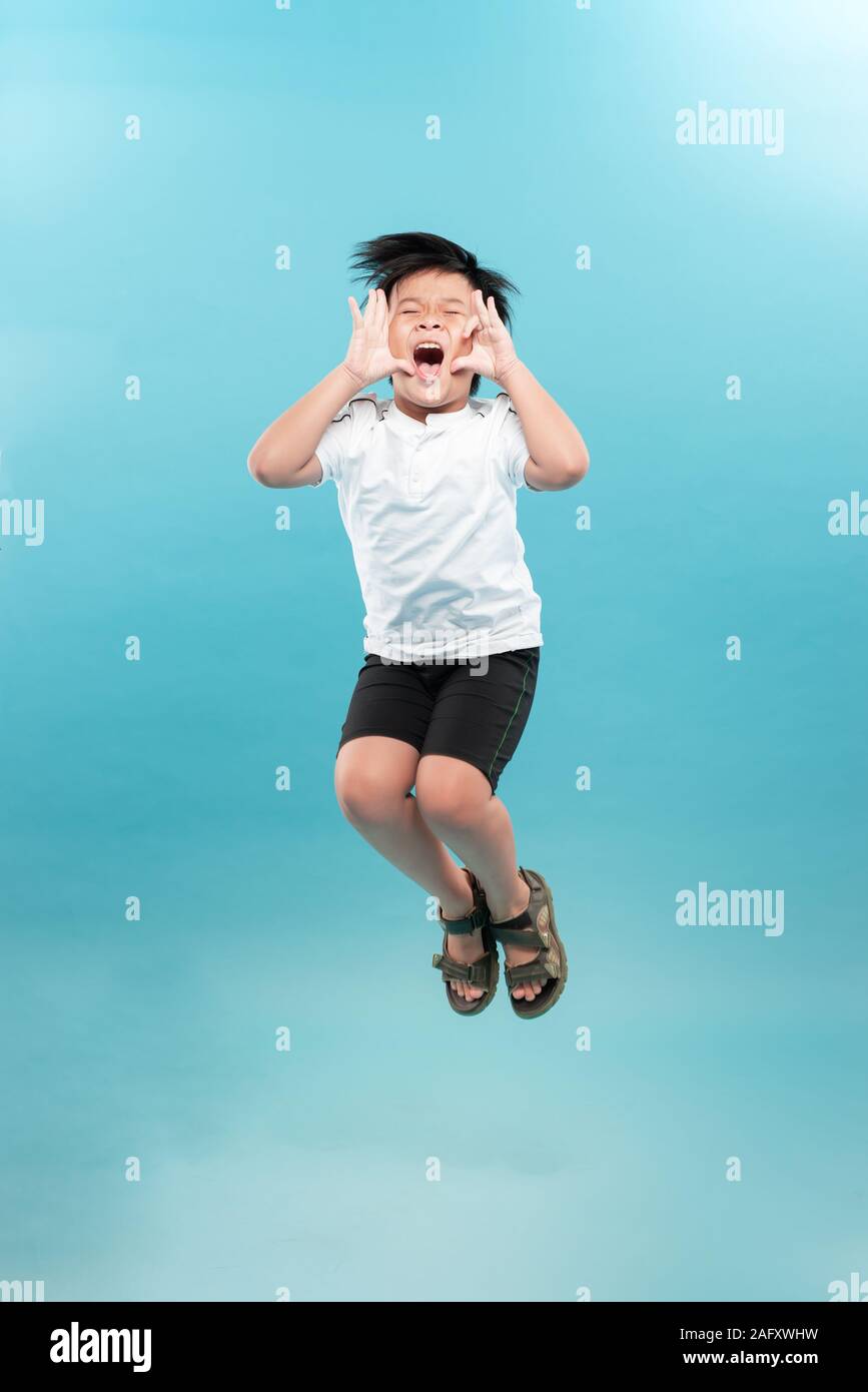 childhood, expressions and people concept - portrait of smiling boy ...