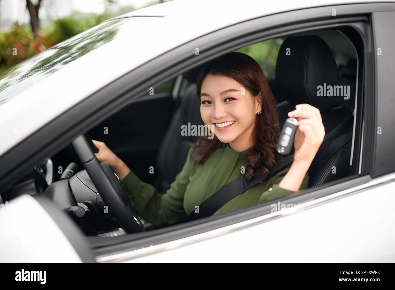 Asian woman hold car key hi-res stock photography and images - Alamy