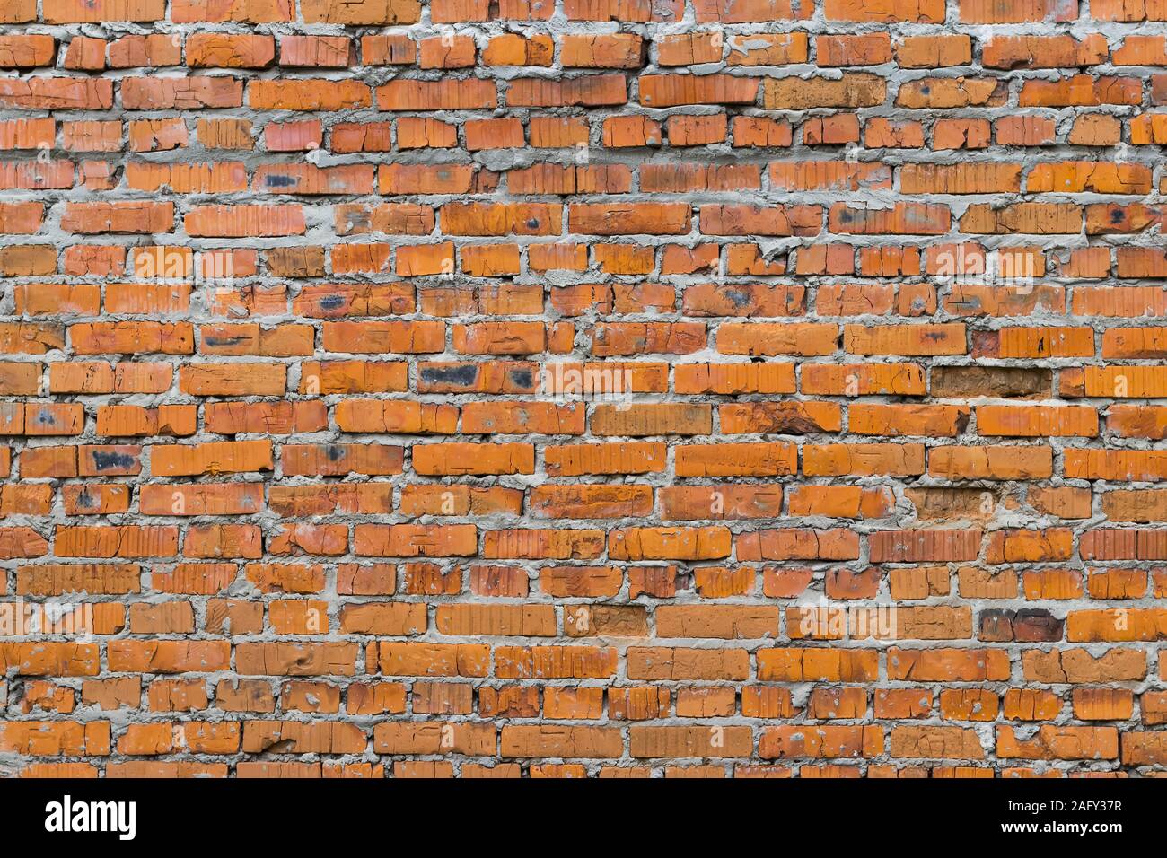 Background of old red stone wall. Texture of brick Stock Photo - Alamy