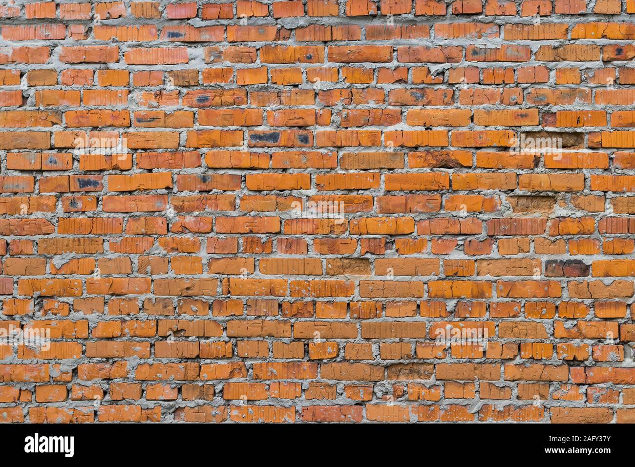Background of old red stone wall. Texture of brick Stock Photo - Alamy