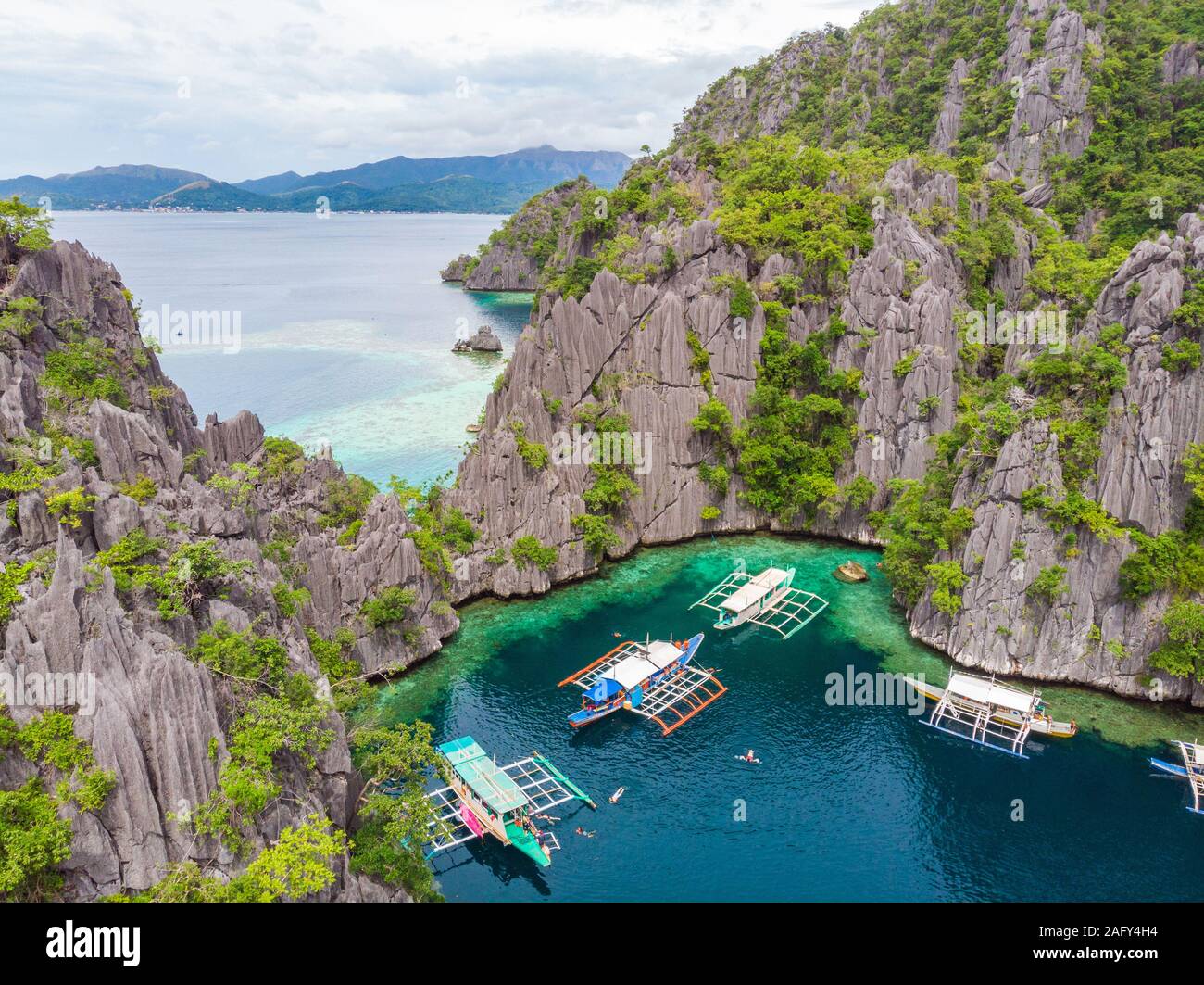 Aerial view of Twin Lagoon on paradise island with sharp limestone ...