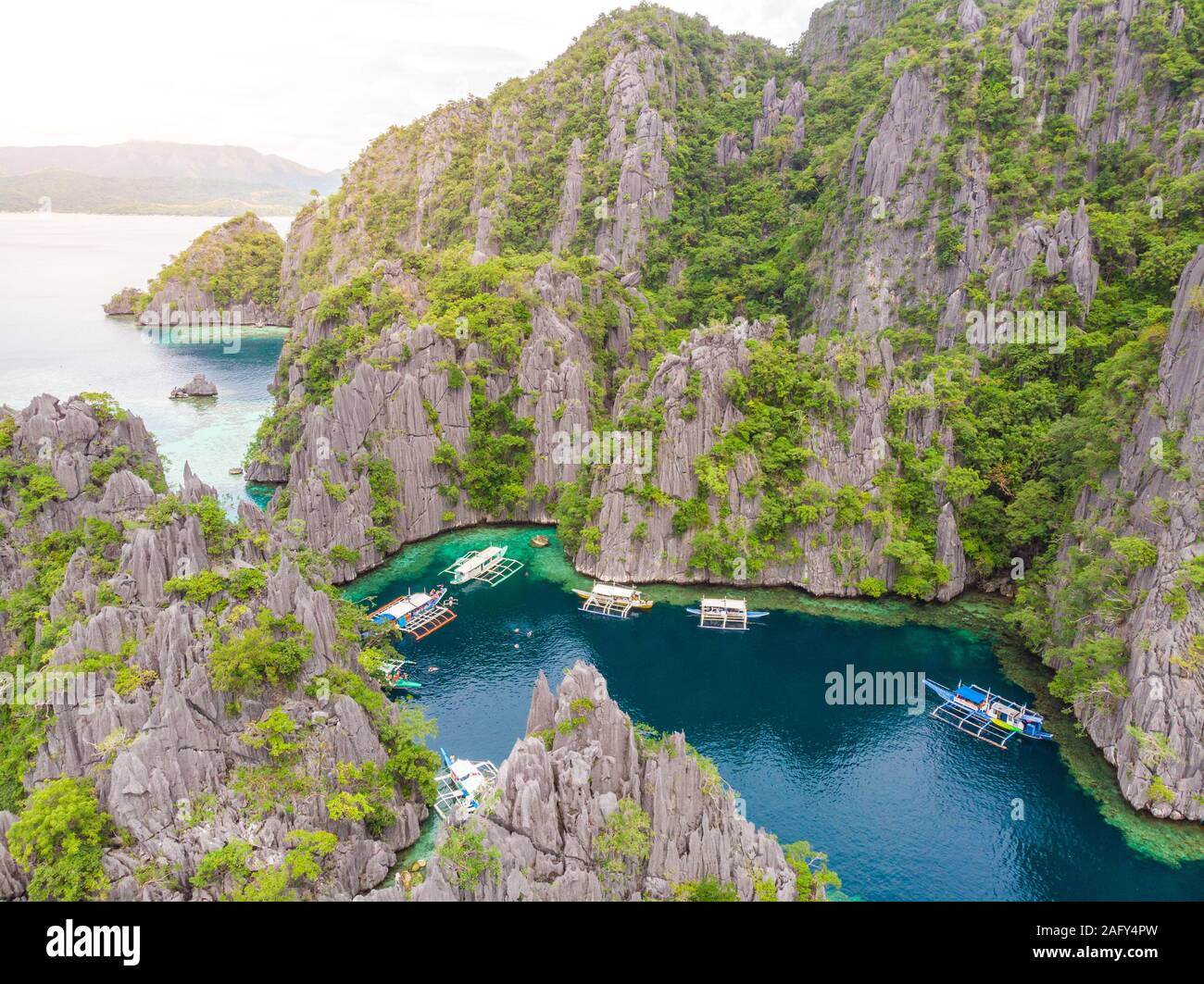 Aerial view of Twin Lagoon on paradise island with sharp limestone ...