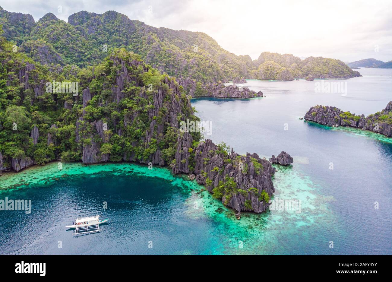 Aerial view of Twin Lagoon on paradise island with sharp limestone ...