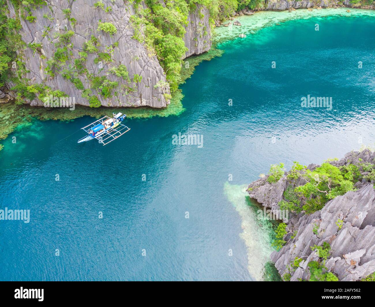 Aerial view of Twin Lagoon on paradise island with sharp limestone ...