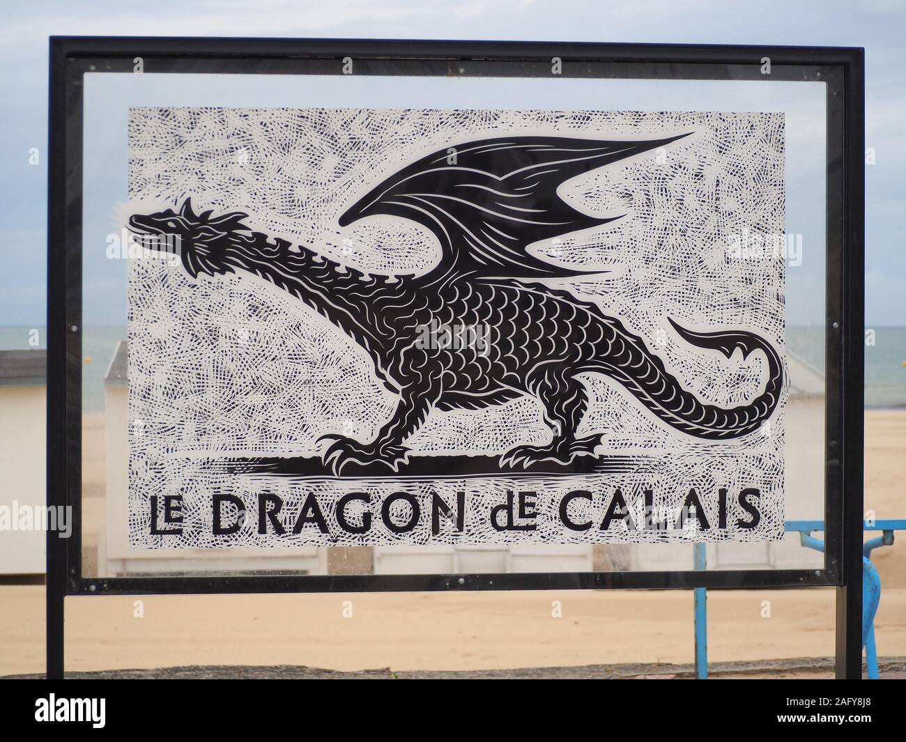 A sign promoting Le Dragon de Calais Stock Photo - Alamy