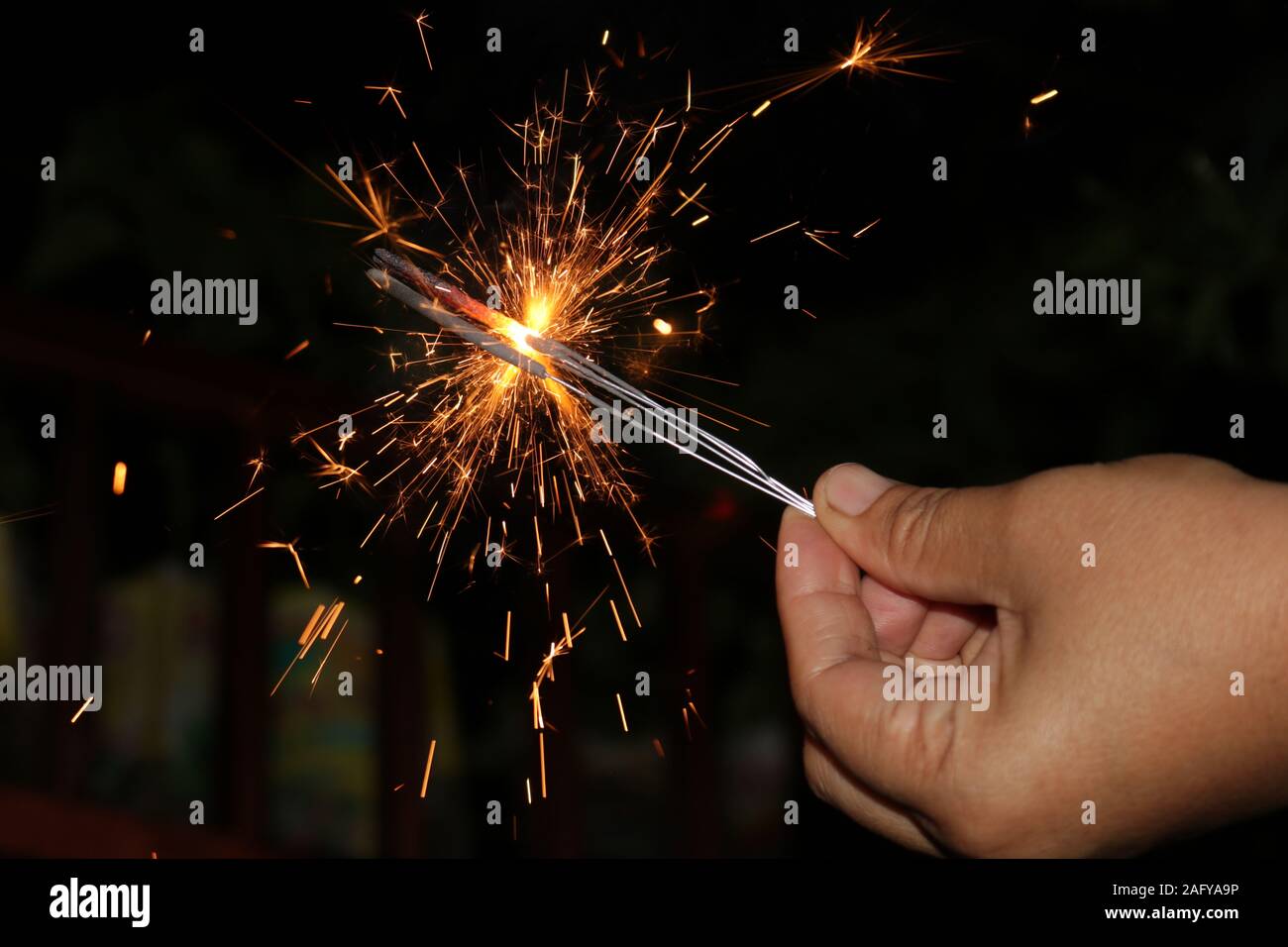 Small fireworks are lit at the new year's event Stock Photo - Alamy