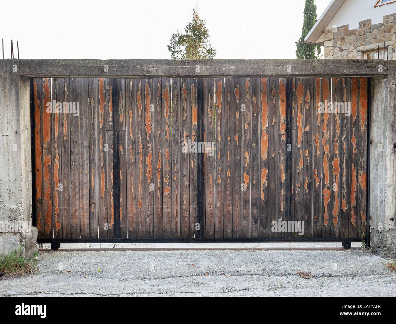 Temporary sliding gate made old painted wood Stock Photo - Alamy