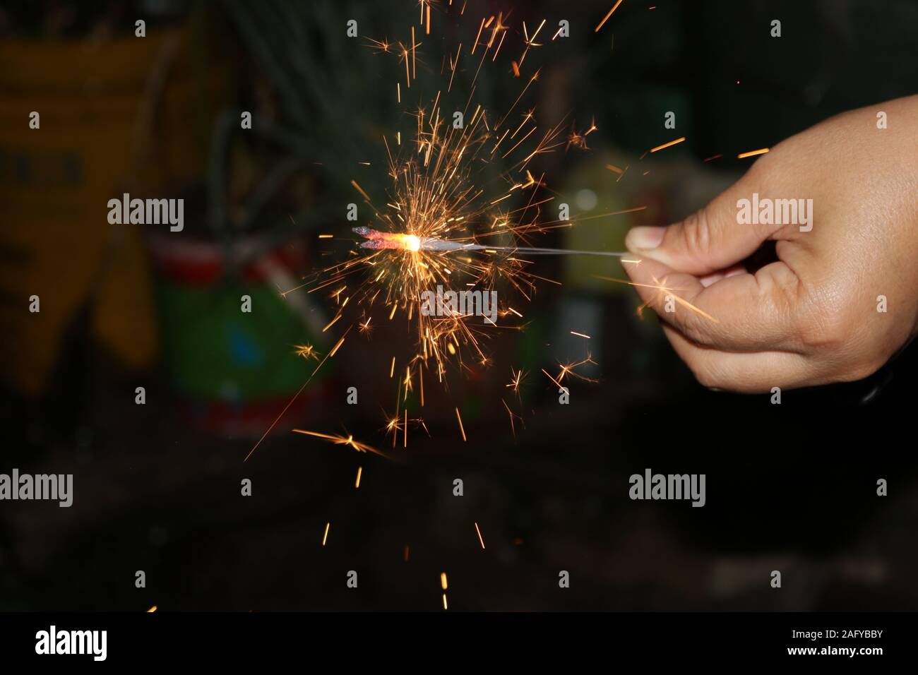 Small fireworks are lit at the new year's event Stock Photo - Alamy