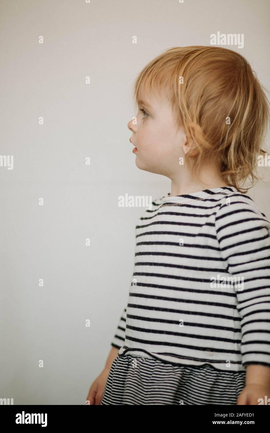 profile of toddler against white background Stock Photo - Alamy