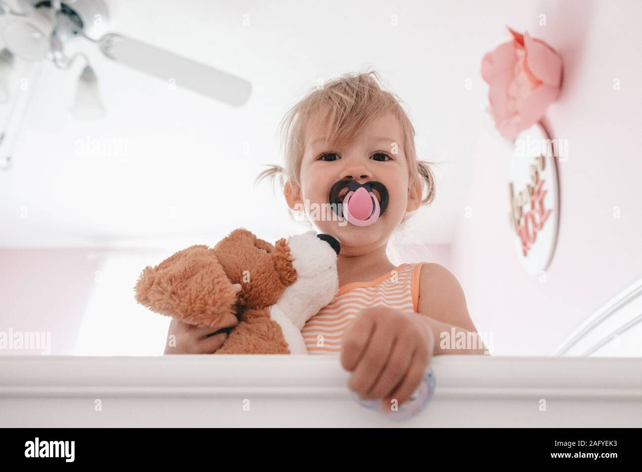 toddler girl wakes up from her nap Stock Photo - Alamy