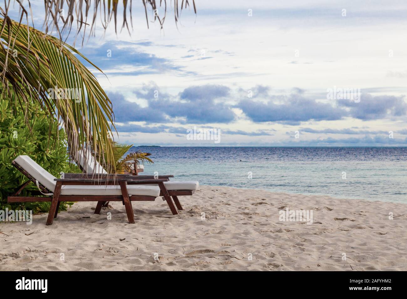 Maldives, tropical paradise, lying on the beach, sunset sunrise Stock ...