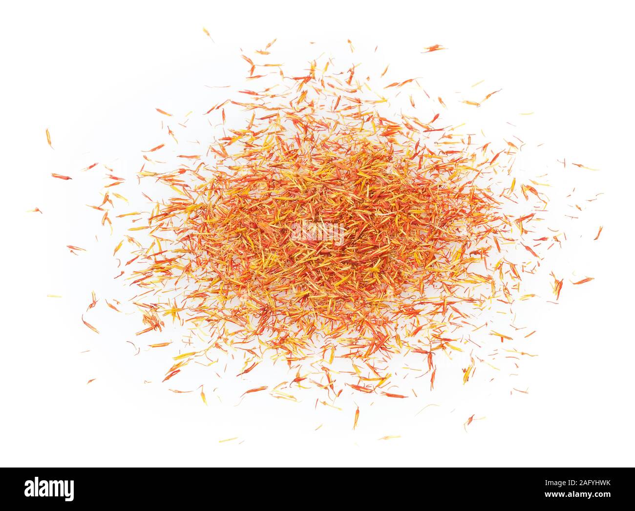 Heap of dried safflower isolated on white background Stock Photo - Alamy