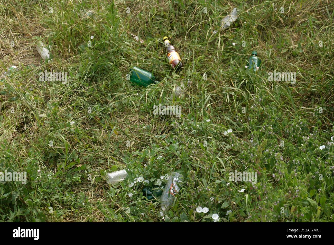 Trash on a field in Romania Stock Photo - Alamy