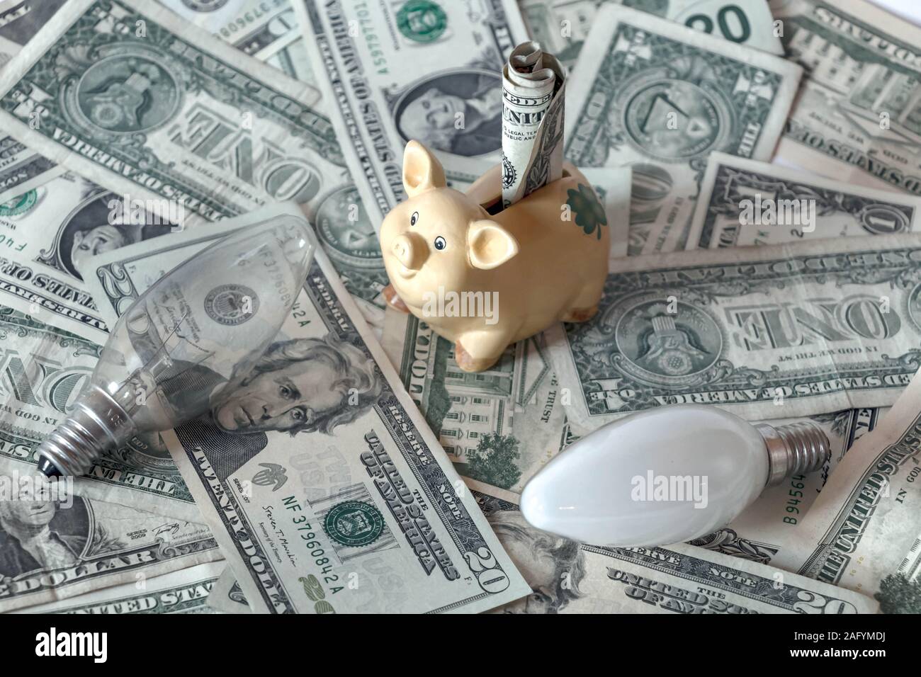 Light bulbs on the usd american dollar background Stock Photo - Alamy