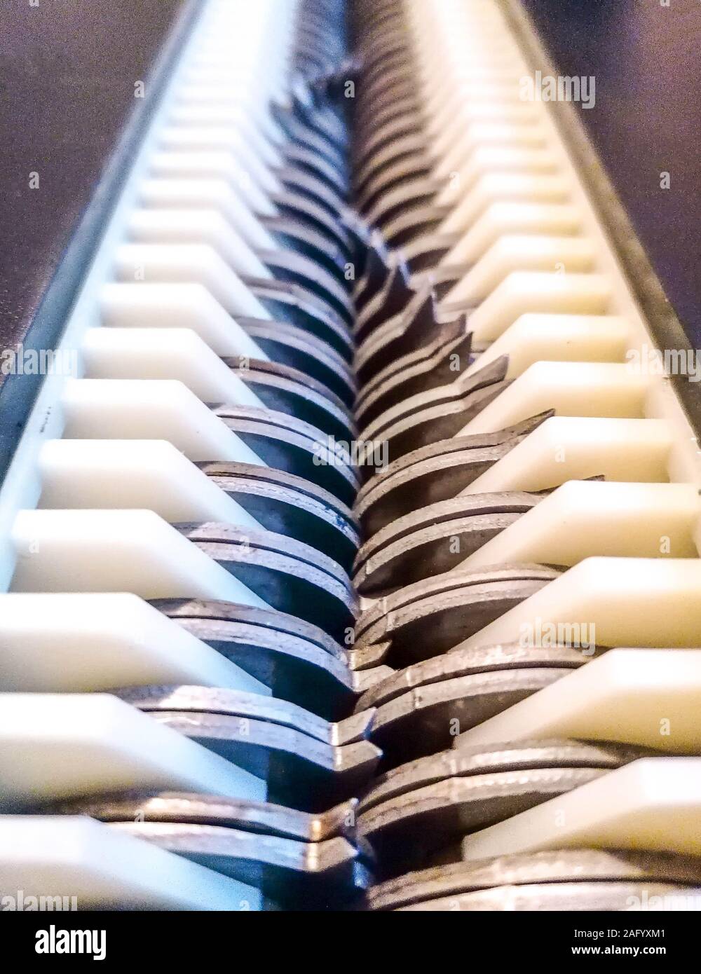 A closeup view of a shredder's teeth, from underneath Stock Photo - Alamy