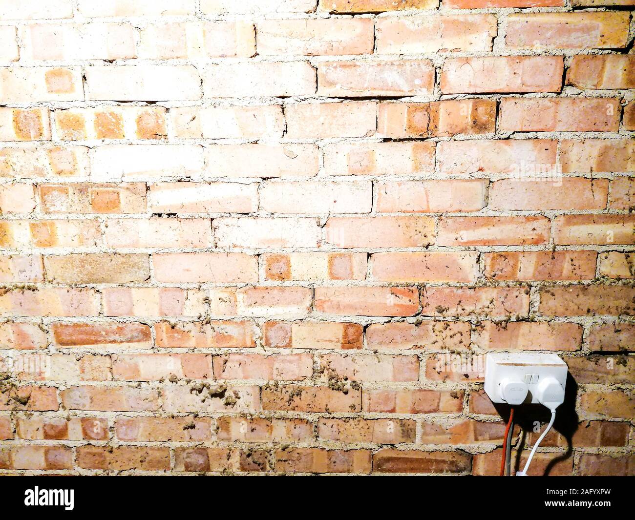 An attic wall is seen to be buckling within the brickwork causing a ...