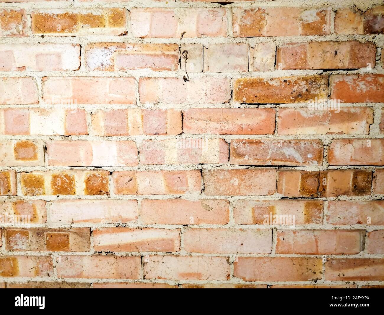 An attic wall is seen to be buckling within the brickwork causing a ...