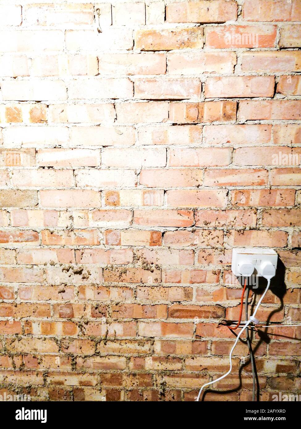 An attic wall is seen to be buckling within the brickwork causing a ...