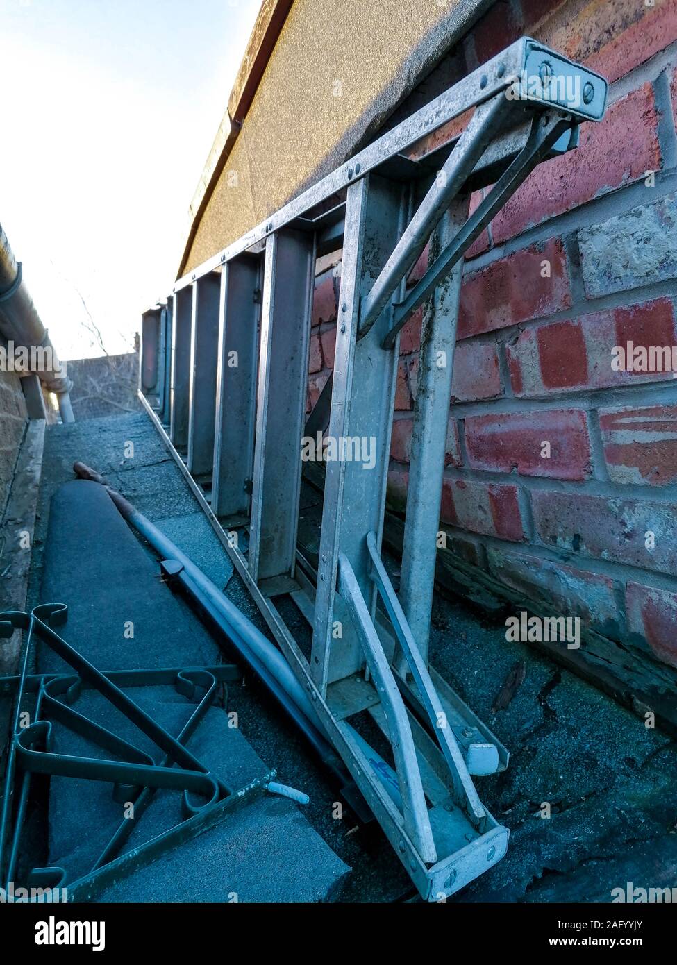 Rooftop ladders hi-res stock photography and images - Alamy
