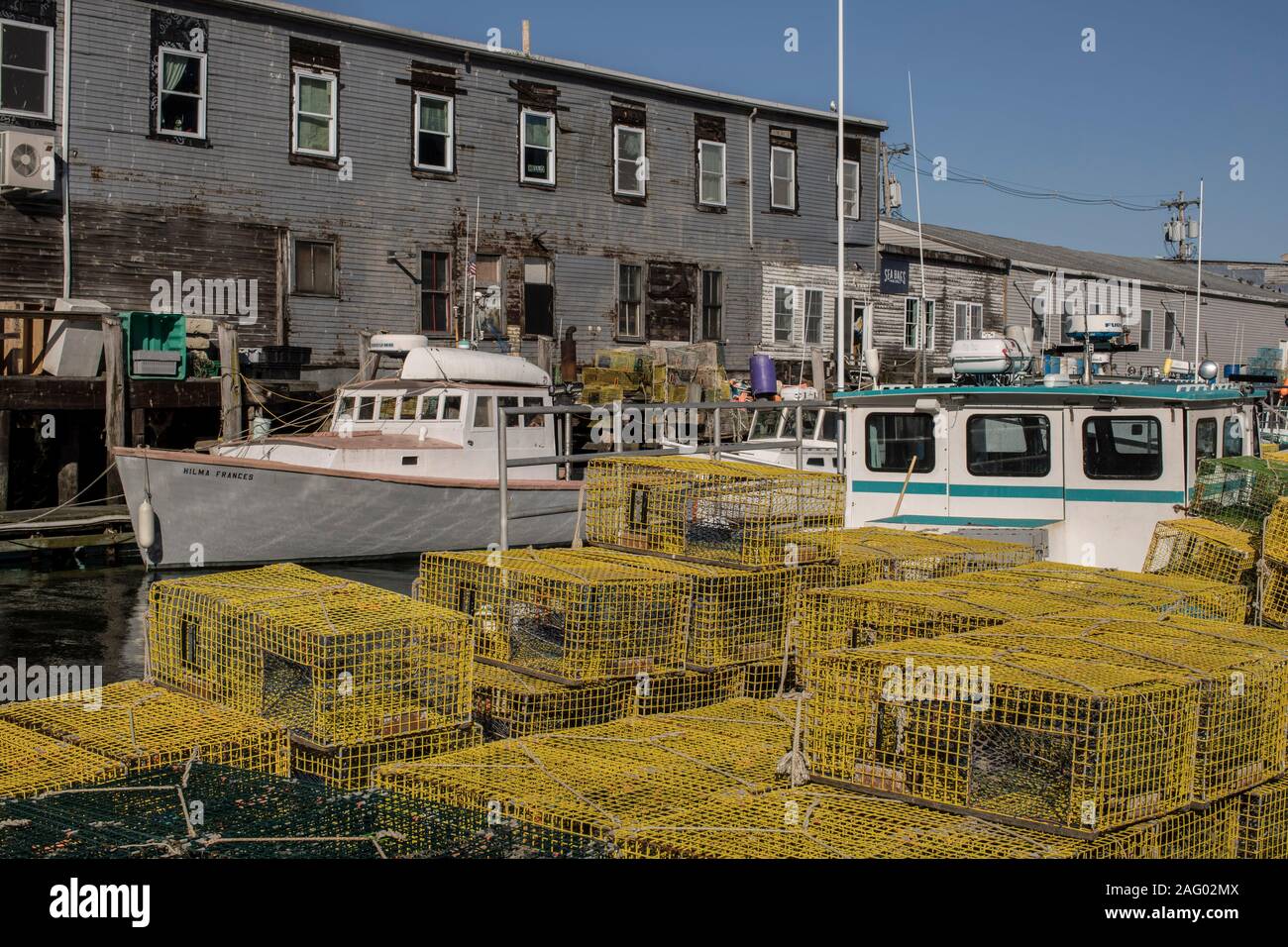 Still a working waterfront in downtown Portland, Maine. Custom House ...