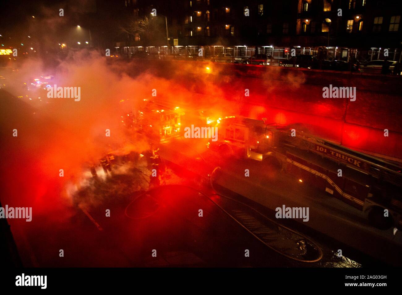New York City Firefighters douse a car fare on Brooklyn, NY's Brooklyn ...