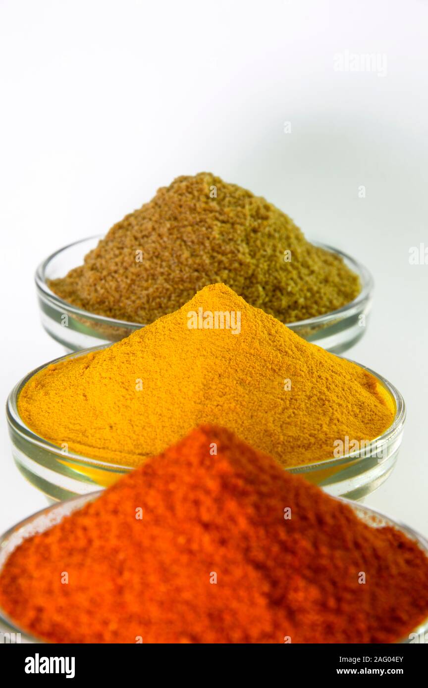 Spice Powder : Chili, Turmeric & Coriander in Bowl isolated on White ...