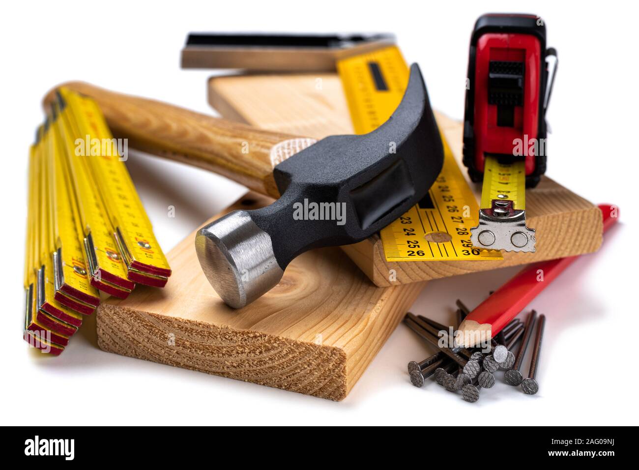 Close-up of hammer and carpenter's tools on a white background ...