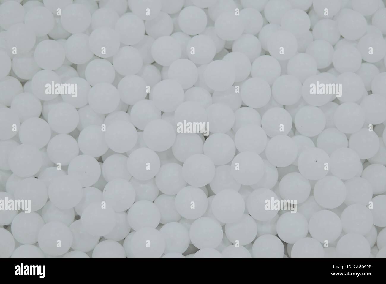 many white round balls texture background white Stock Photo - Alamy