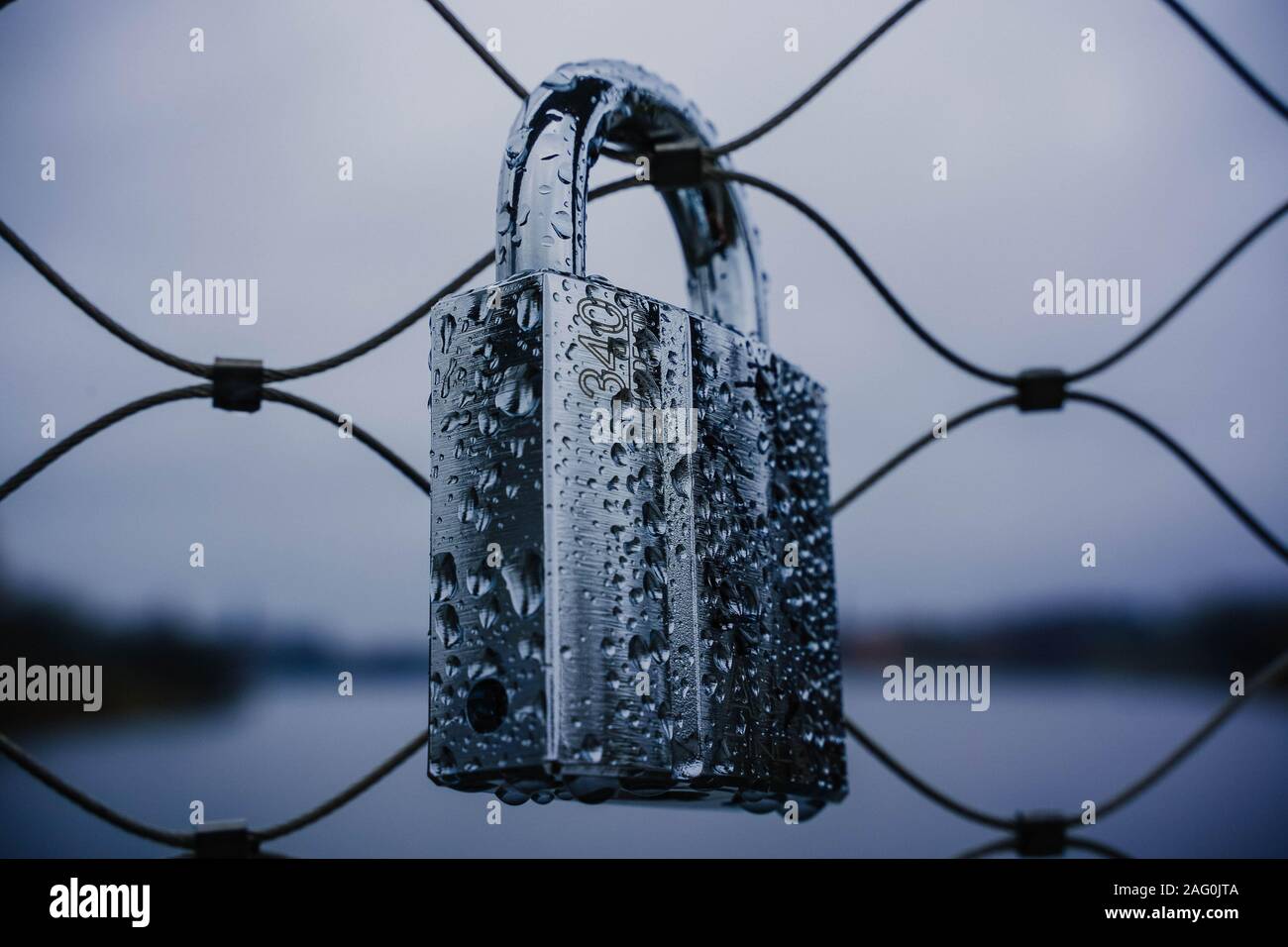 padlock with rain Stock Photo - Alamy