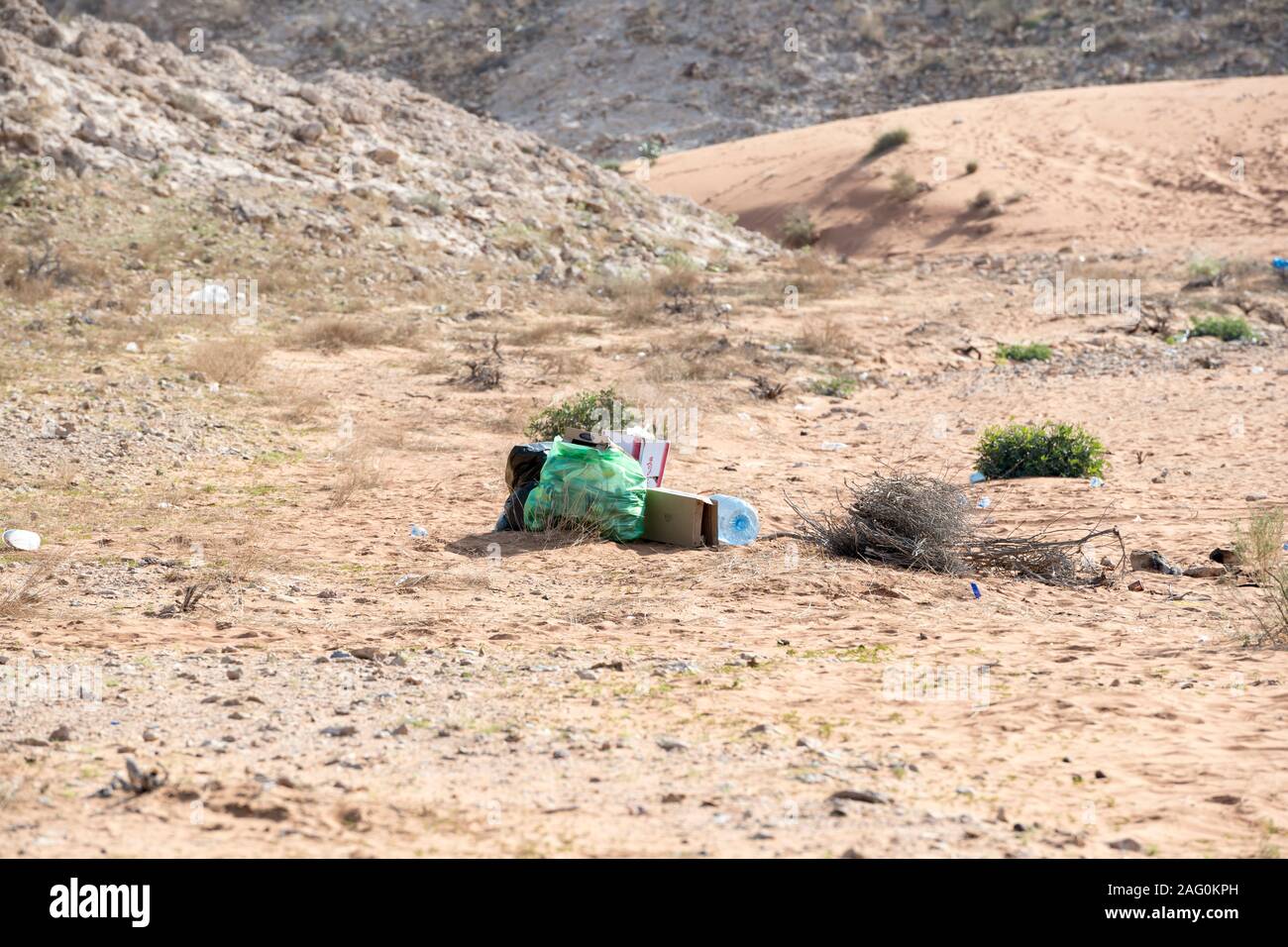 Garbage left in Desert (plastic bag, plastic bottles, cartoons and ...