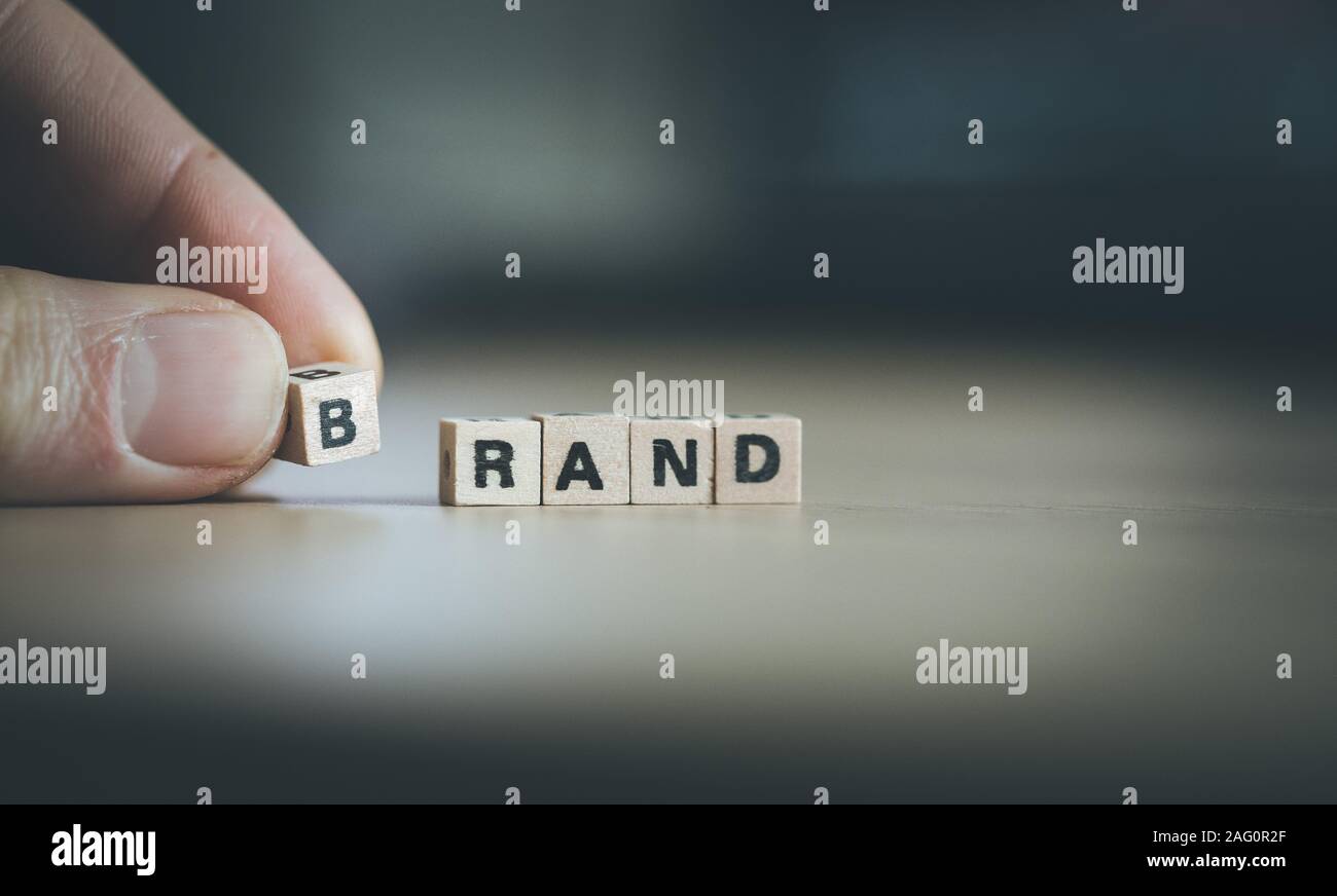 Wood cubes with the word “Brand”, close up picture with copy space ...