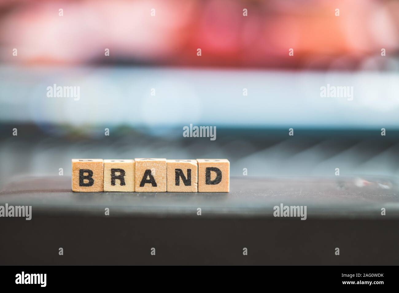 Wood cubes with the word “Brand”, close up picture with copy space ...