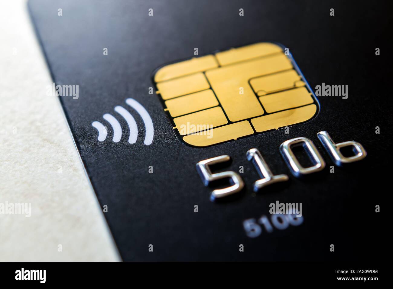 Black credit cards with chip and contactless pay technology close-up ...