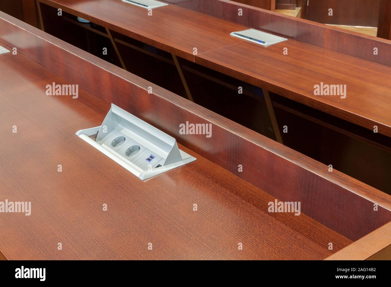 wooden conference table with smart charger, close up Stock Photo - Alamy