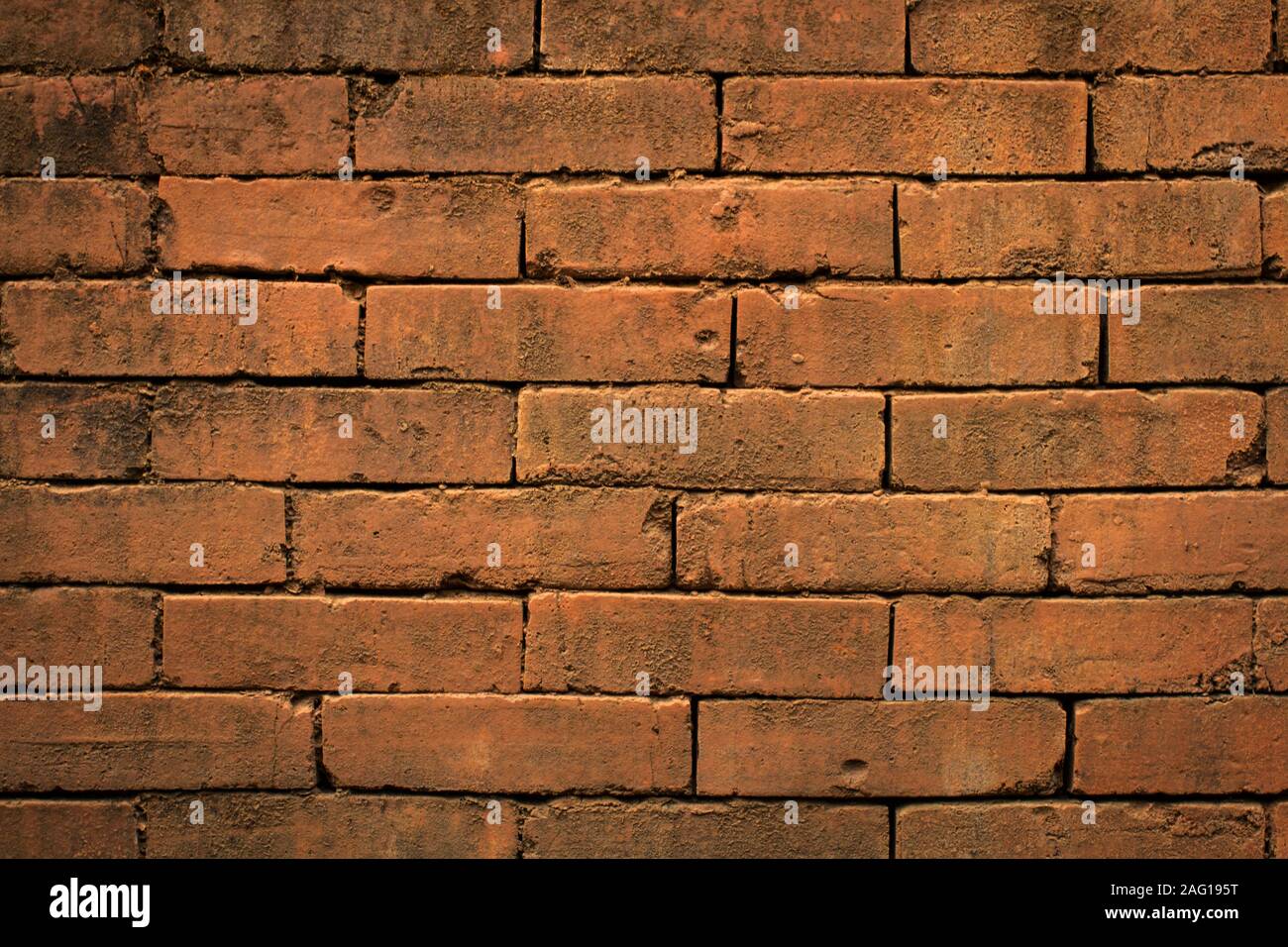 Close-up red brick wall background image Stock Photo - Alamy