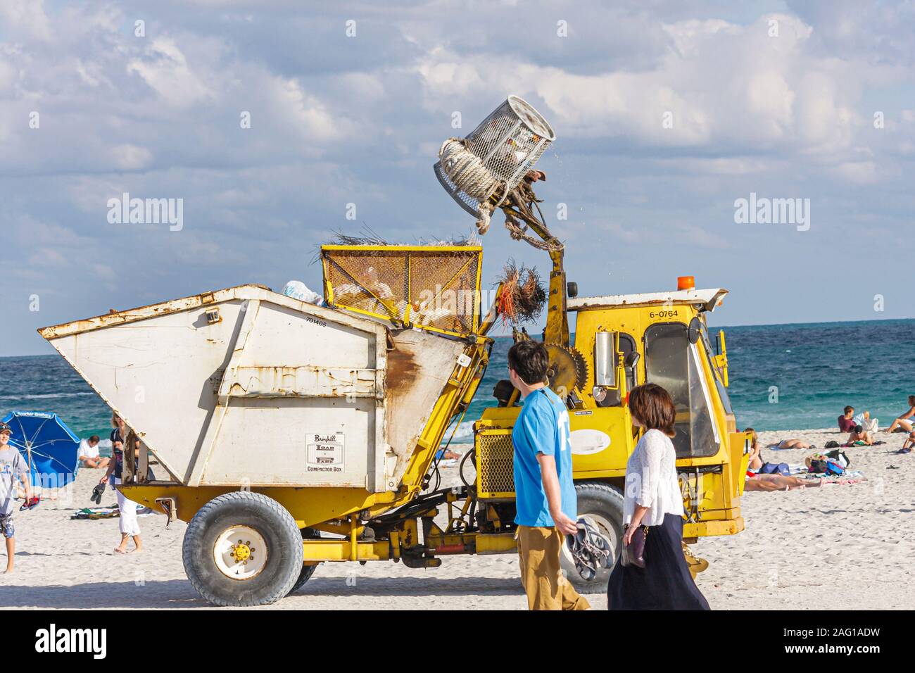 Miami Beach Florida,Atlantic Ocean water trash collection,garbage truck ...