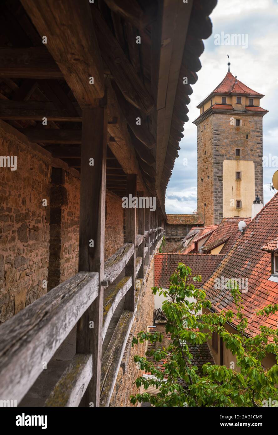 Roofed city wall corridor leading to the Roder Gate Tower at Rothenburg ...