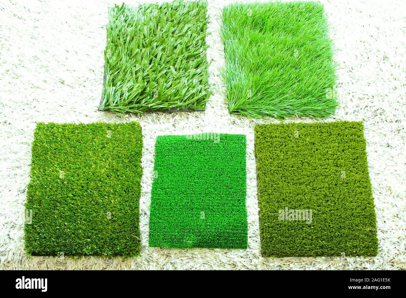 Five different samples of green grass style Stock Photo - Alamy