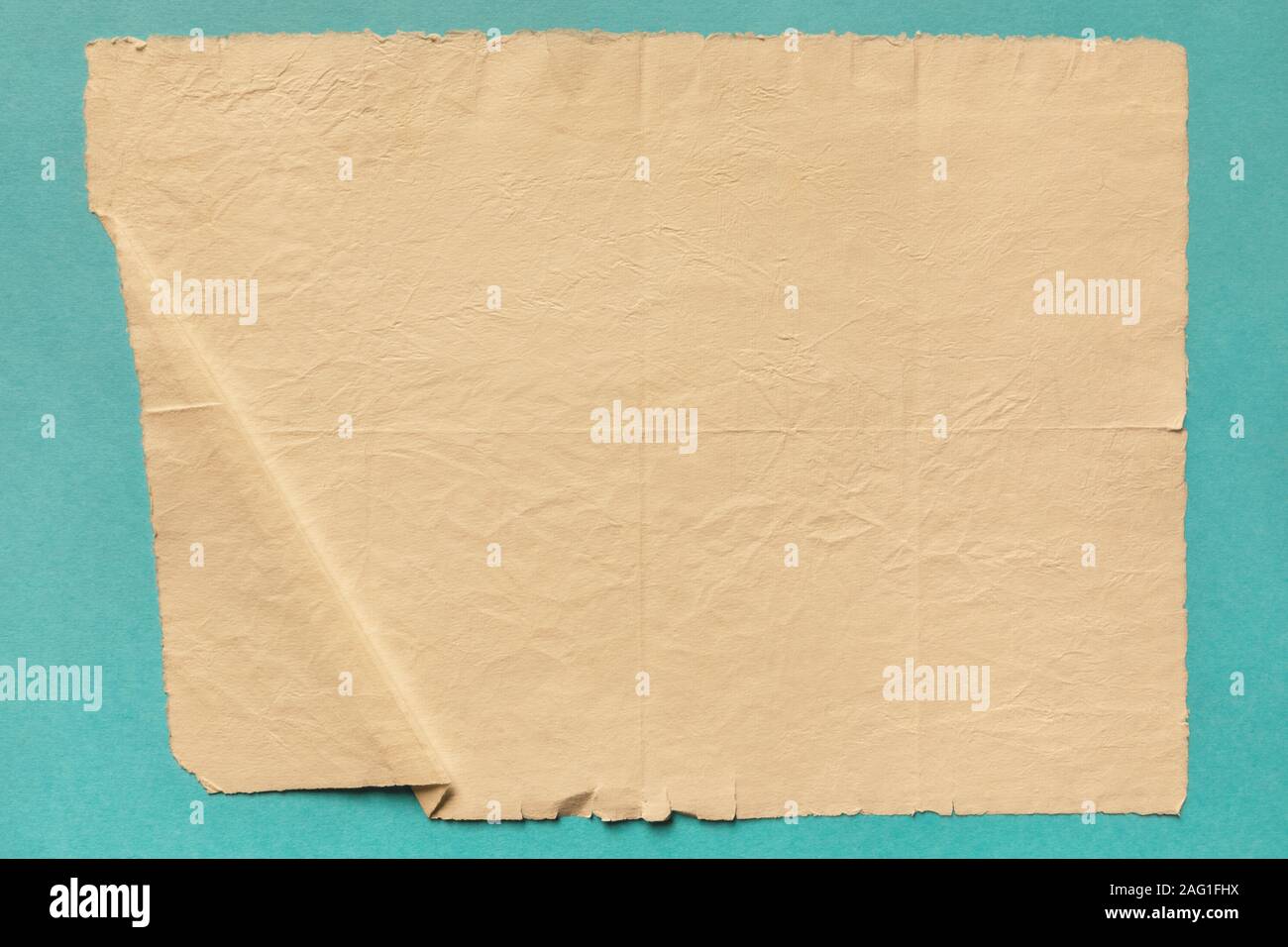Close-up of old paper with crease, texture background Stock Photo - Alamy