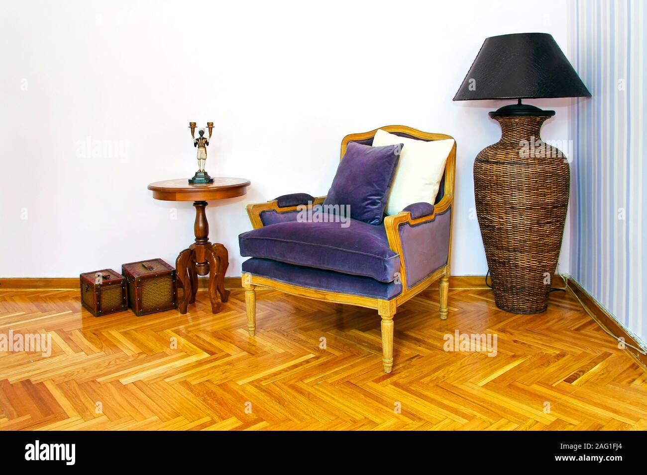 Interior of reading room with vintage style armchair Stock Photo - Alamy