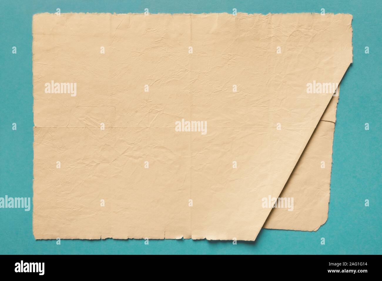 Close-up of old paper with crease, texture background Stock Photo - Alamy