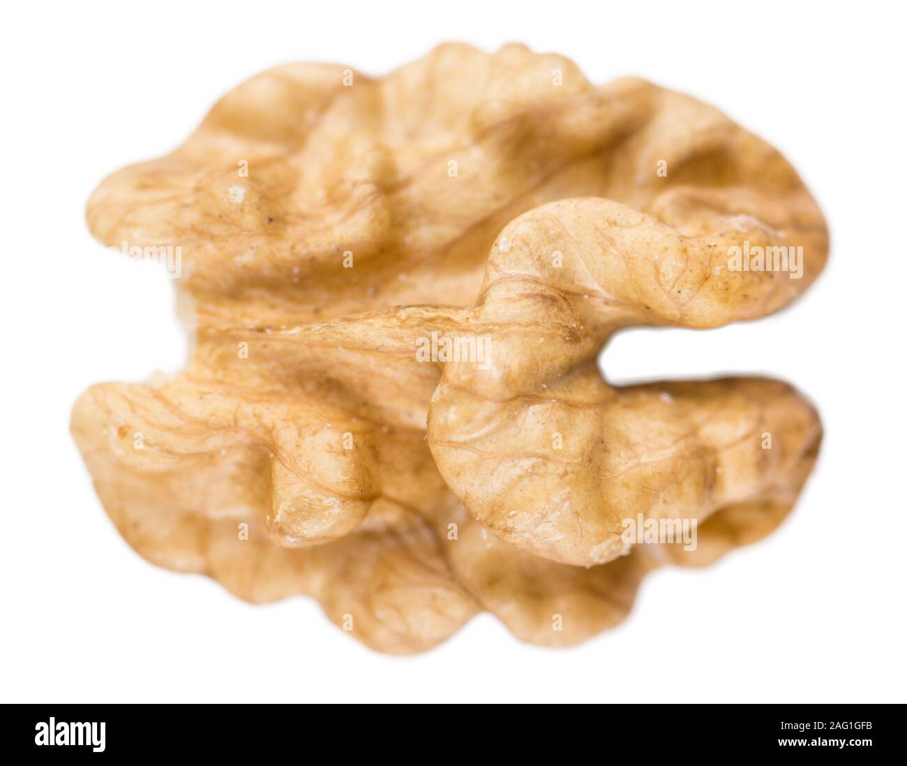 Portion of Walnut kernels (as close-up shot) isolated on white ...
