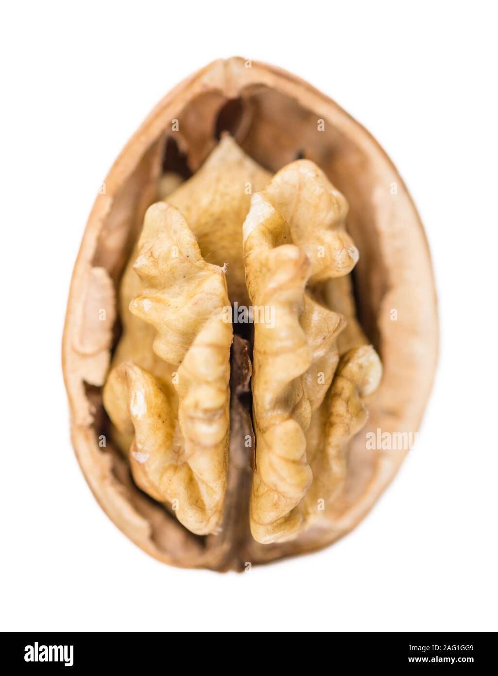 Portion of Walnut kernels (as close-up shot) isolated on white ...