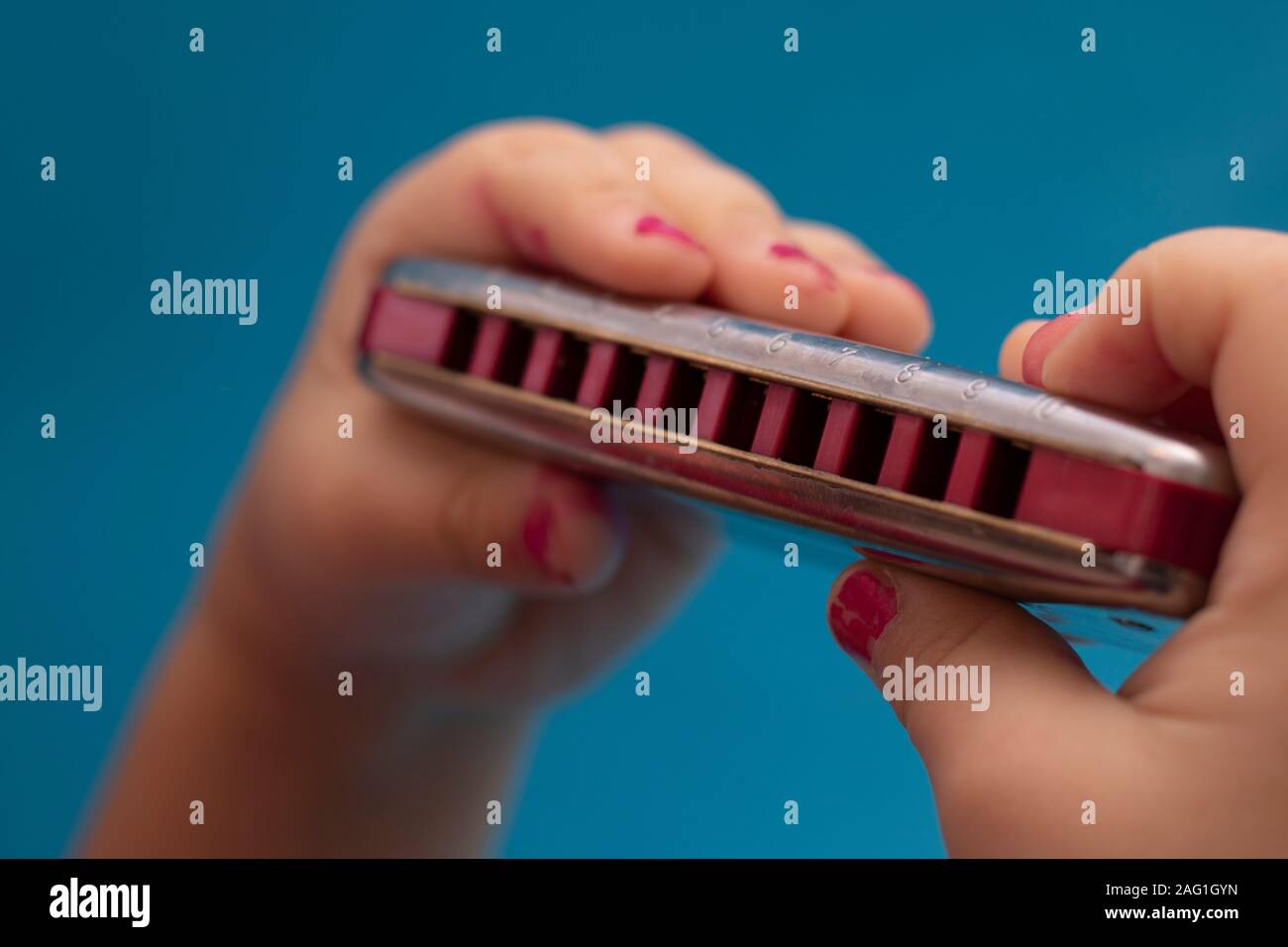Harmonica girl hi-res stock photography and images - Alamy
