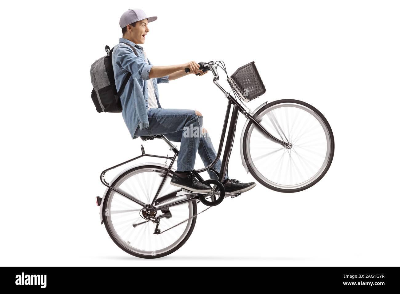 Young boy riding bicycle Cut Out Stock Images & Pictures - Alamy