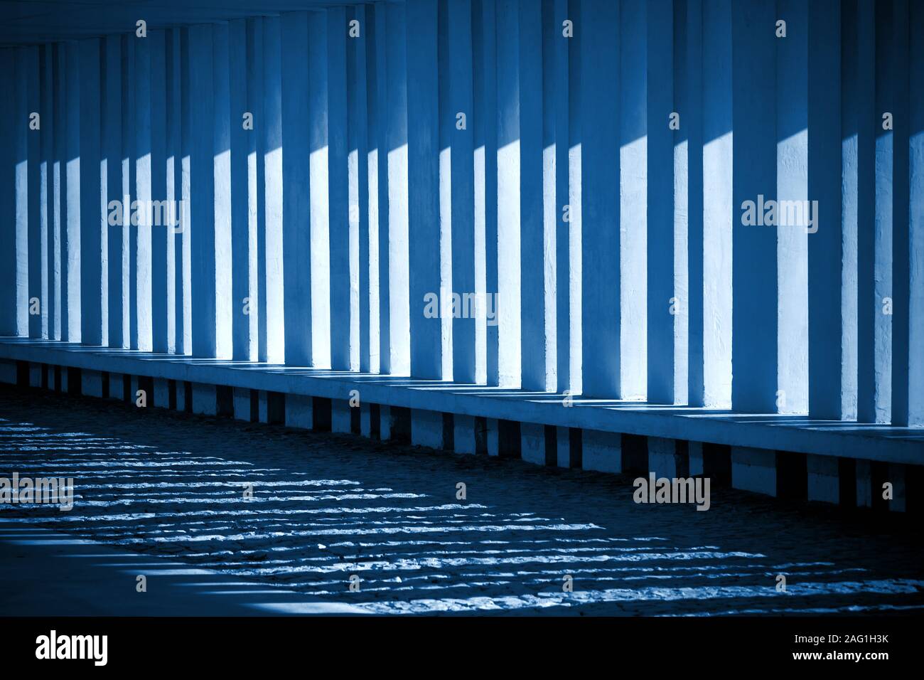 Geometry in Architecture. Sunlight and Shadows Through Columns of ...