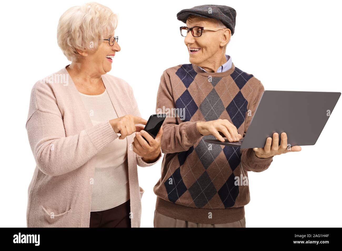 Senior people using modern technology, a laptop computer and a ...